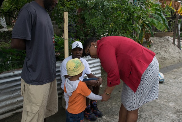 Minister of Health donates tools to Rasville residents to aid in clean ...